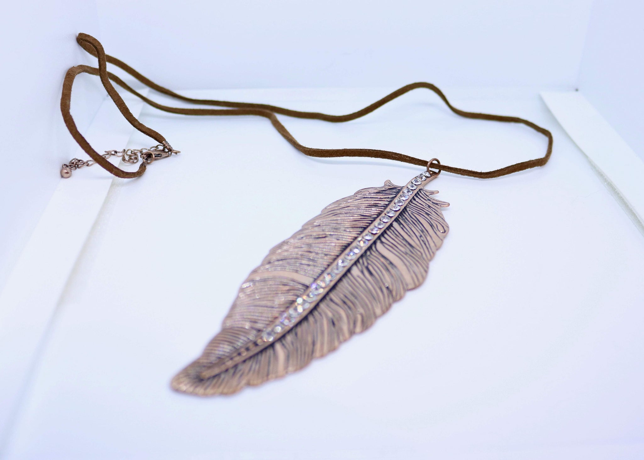 Copper Feather with Diamonte detail on a Suedette Cord Necklace - By F ...